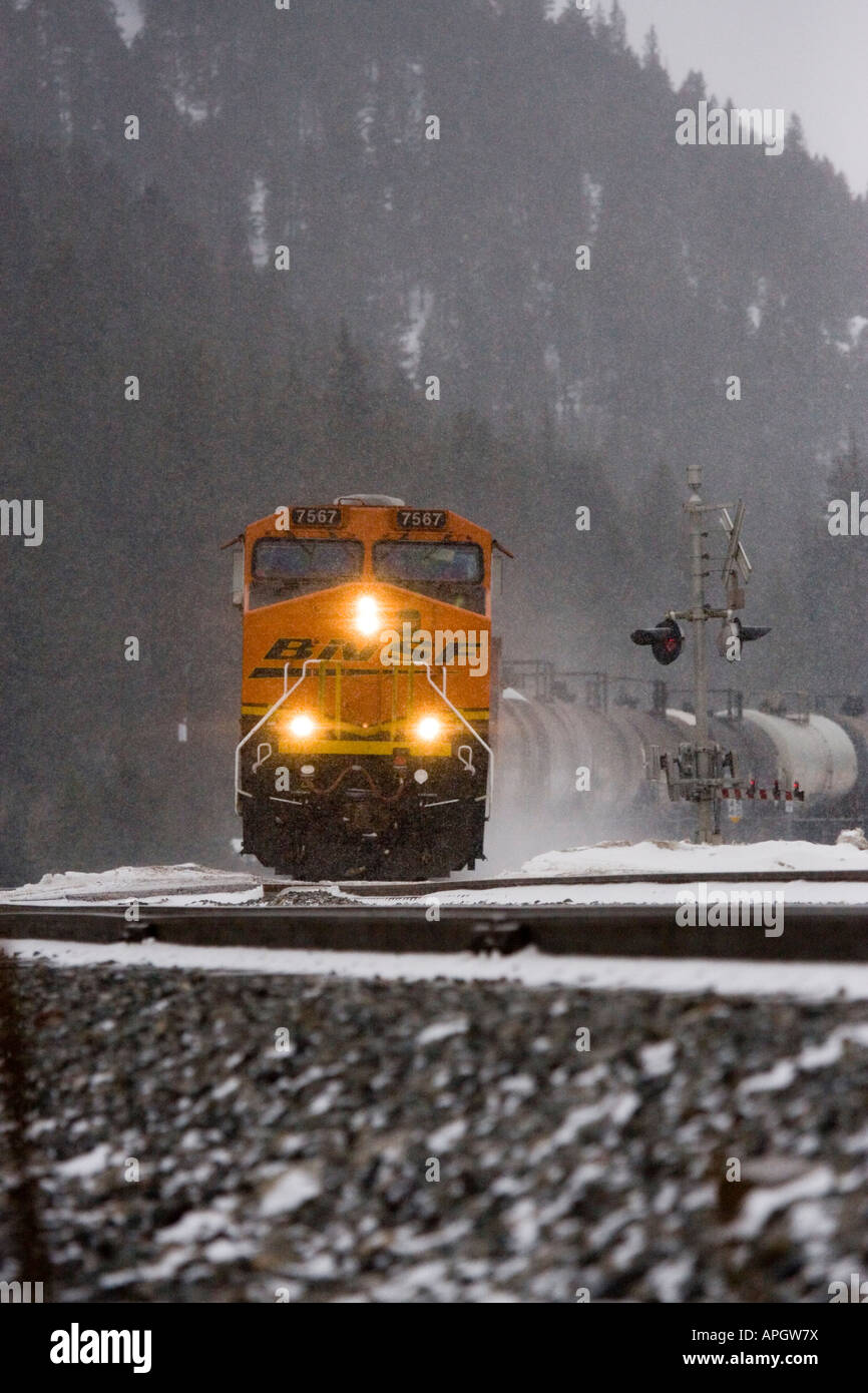 Freight train in snow Stock Photo - Alamy