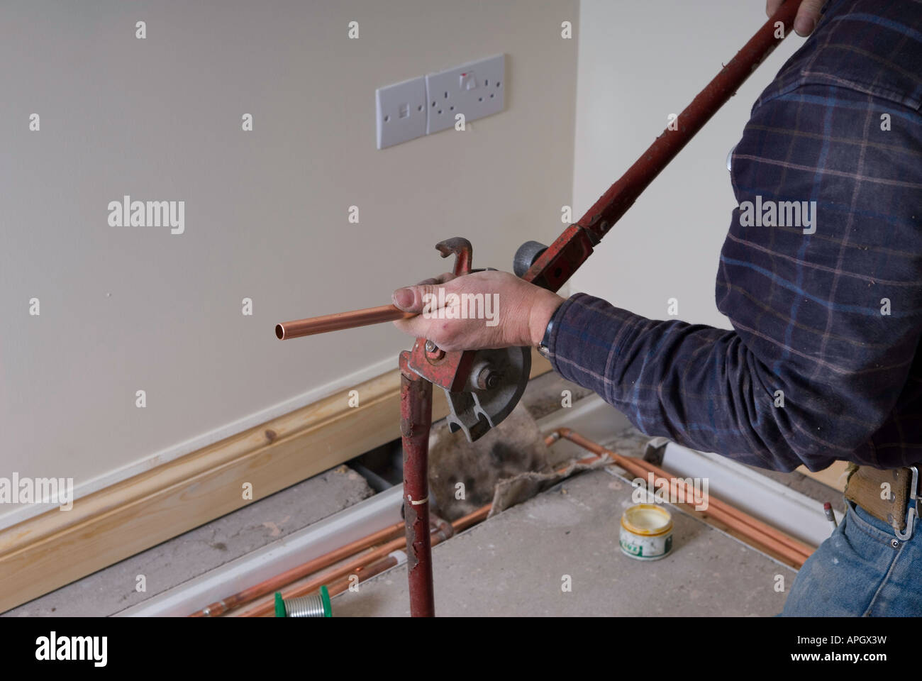 Bending copper pipe Stock Photo - Alamy