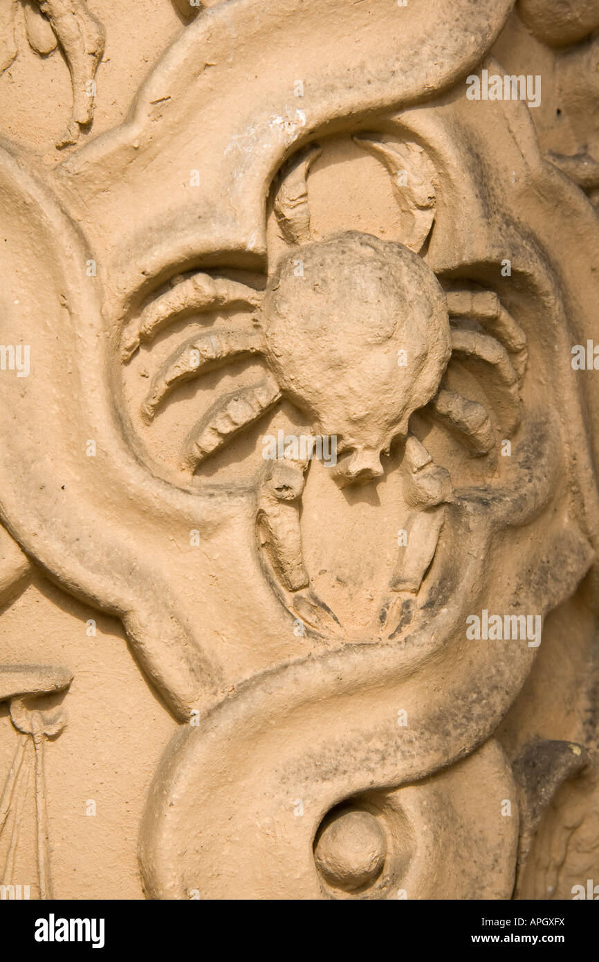 Detail of carved pillar with astrological symbol of cancer Stock Photo ...