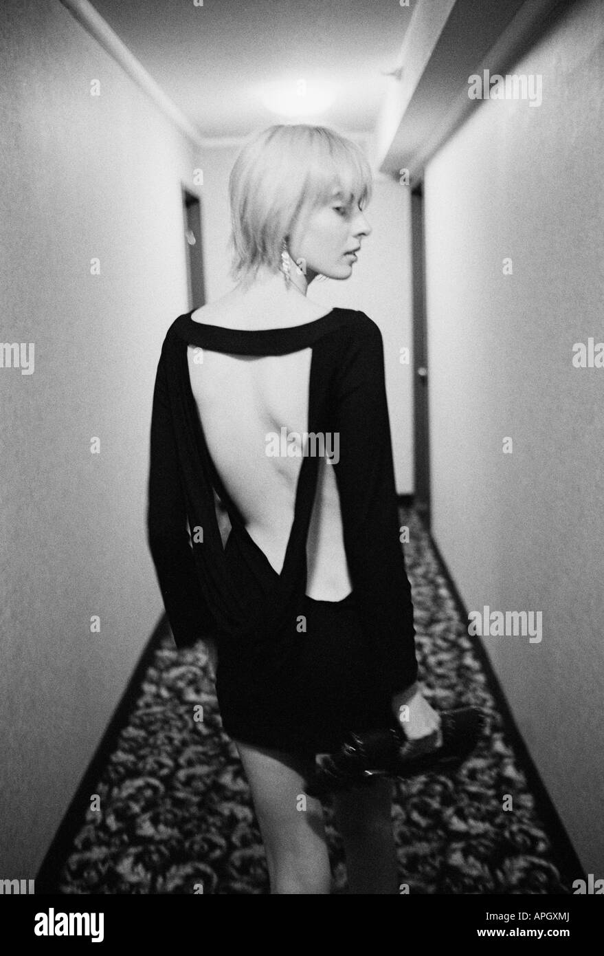 Woman coming home from a night out Stock Photo - Alamy