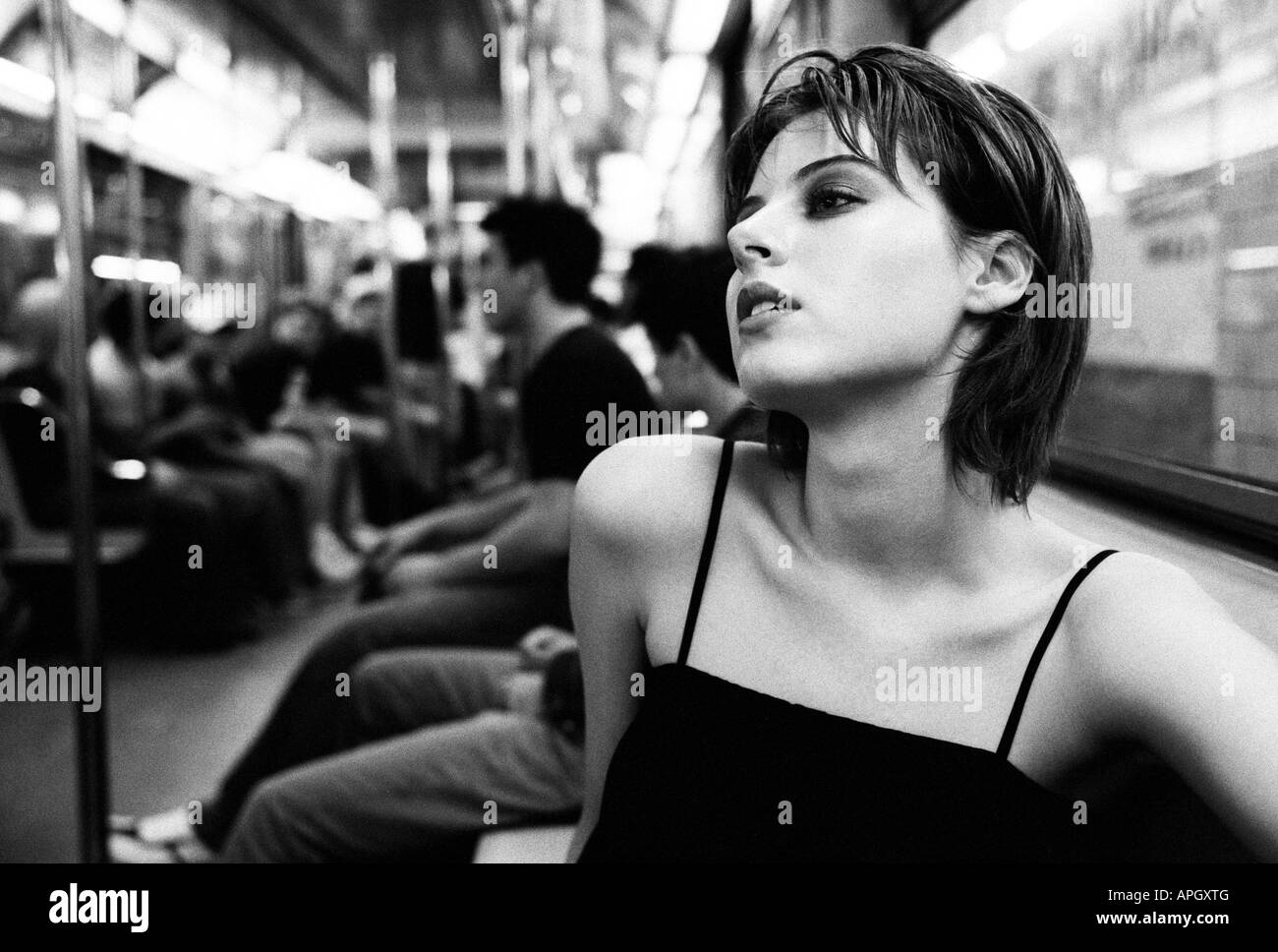 Young woman riding the subway in New York City Stock Photo - Alamy