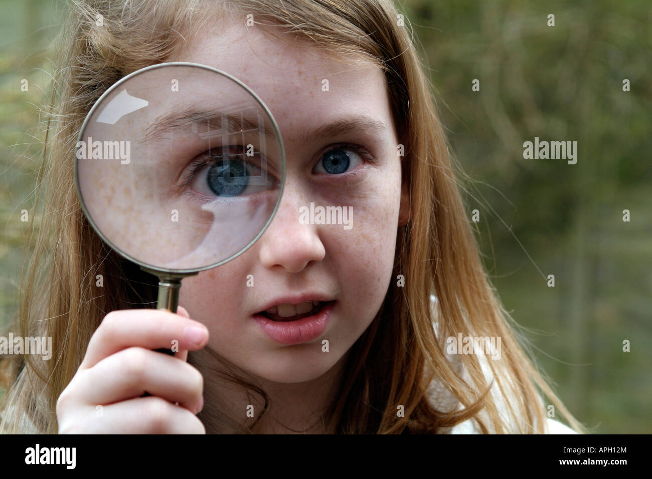 Child Holding Magnifying Glass Stock Photo - Alamy