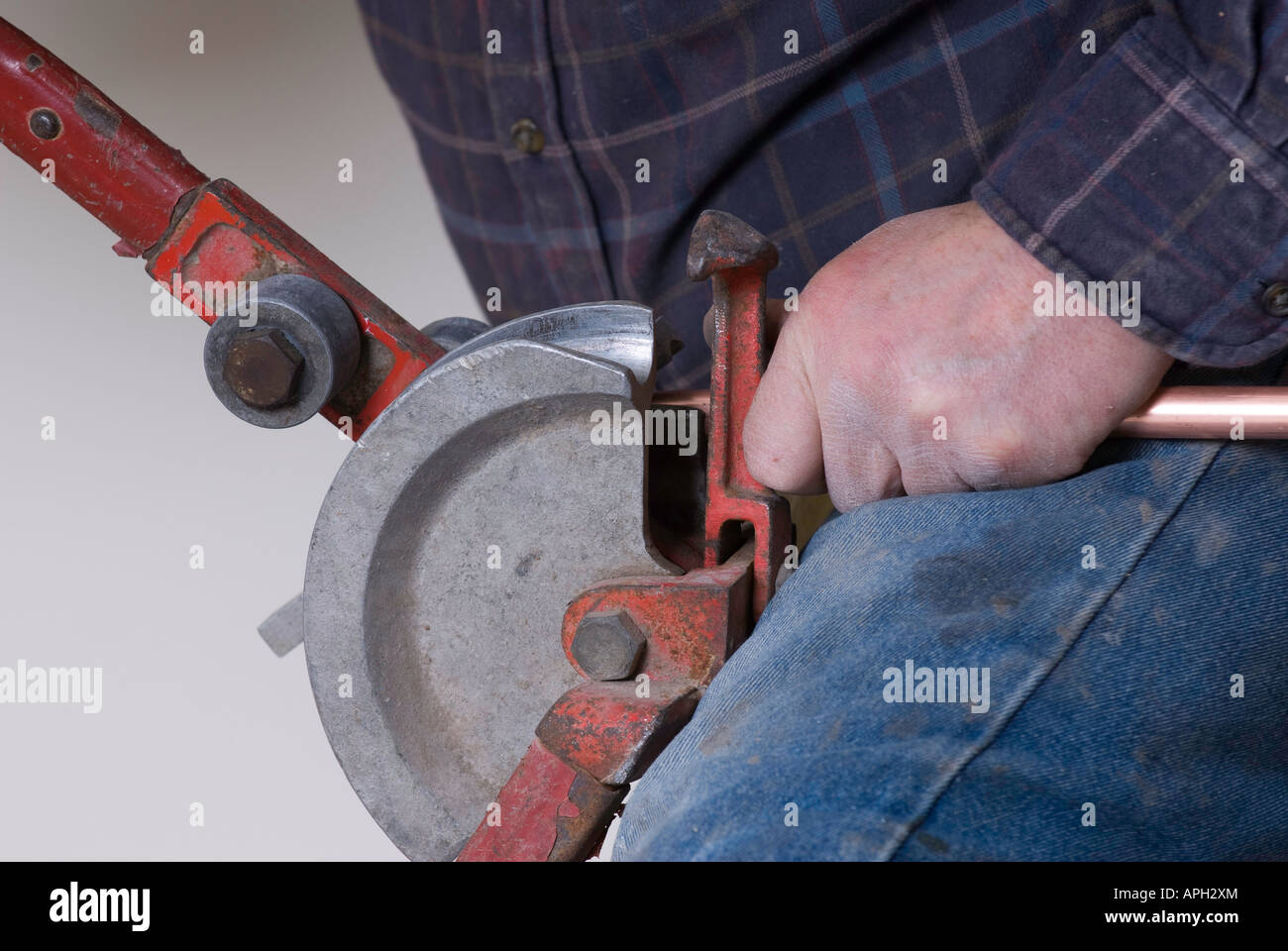 Plumber bending copper pipe hi-res stock photography and images - Alamy