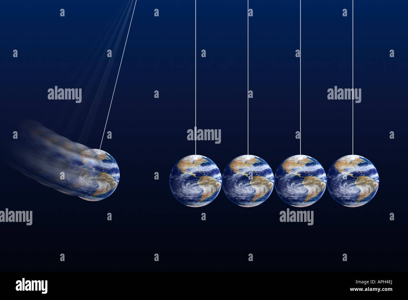 Planet earth cradle in action (motion blur) on a dark blue background ...