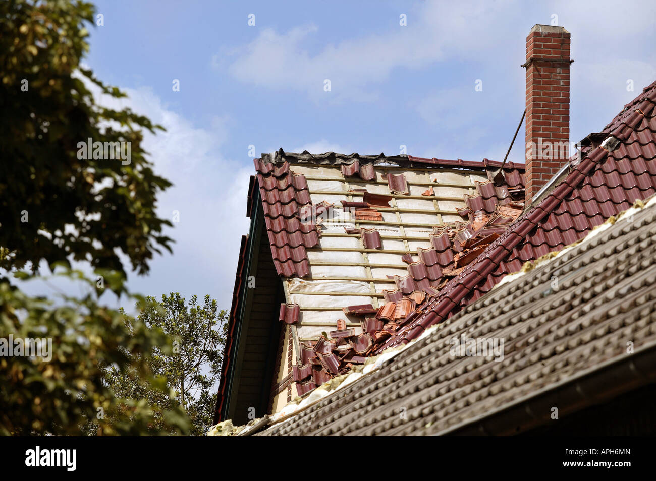 roof of house damaged by storm Stock Photo - Alamy