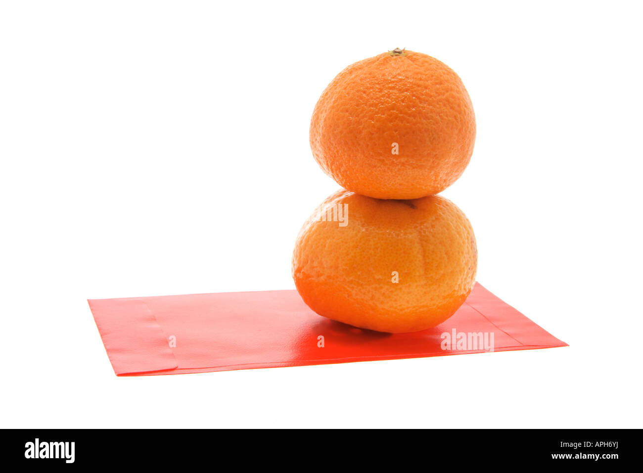 Mandarins and Red Packet Stock Photo - Alamy