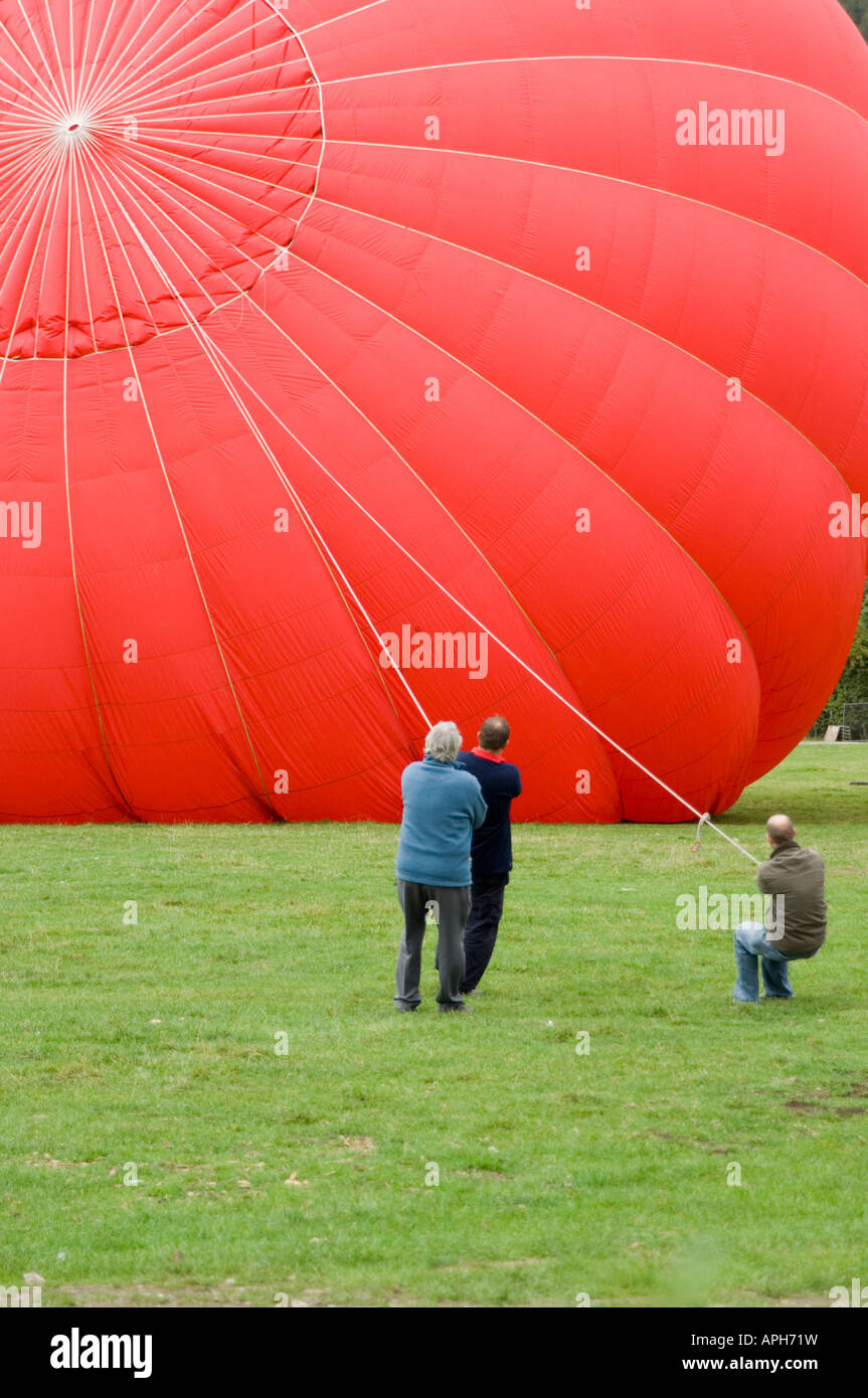 Launching hot air balloon Stock Photo - Alamy