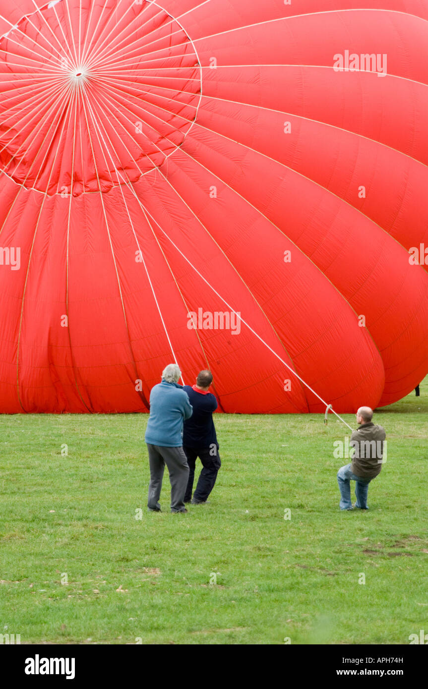 Launching hot air balloon Stock Photo - Alamy