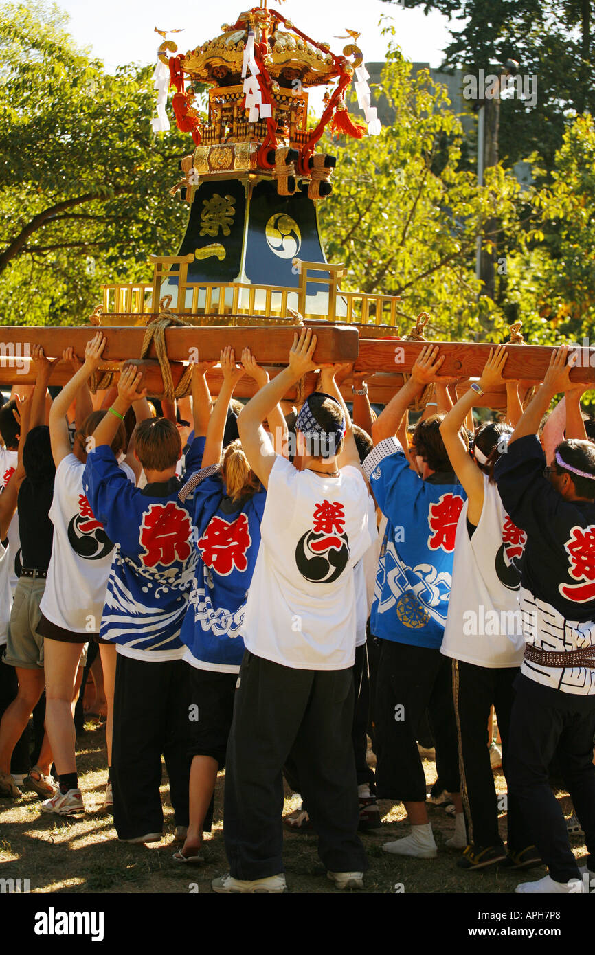 The Japanese people carrying a mikoshi portable shrine on their ...