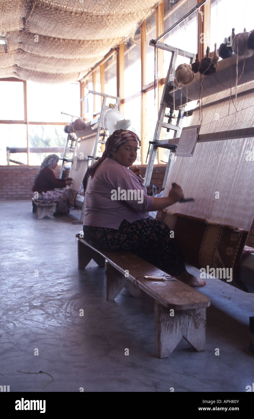 Women weaving rugs, Turkey Stock Photo - Alamy