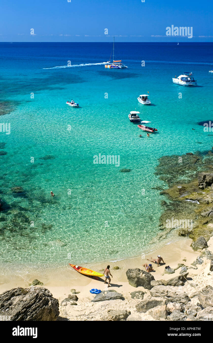 People and boats. Cala Vella beach. South of Mallorca Island. Spain ...