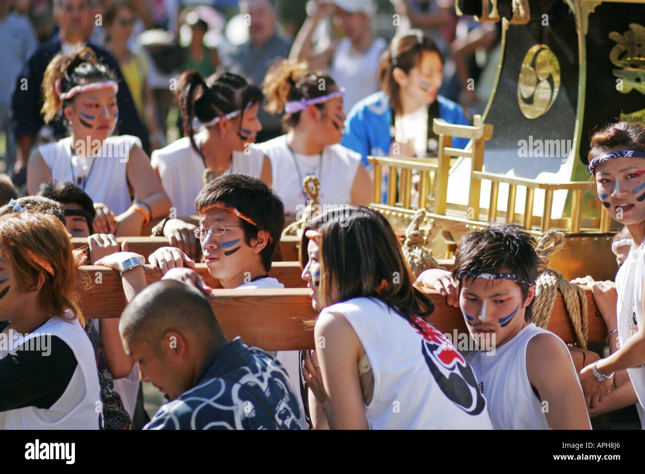 The Japanese people carrying a mikoshi portable shrine on their ...