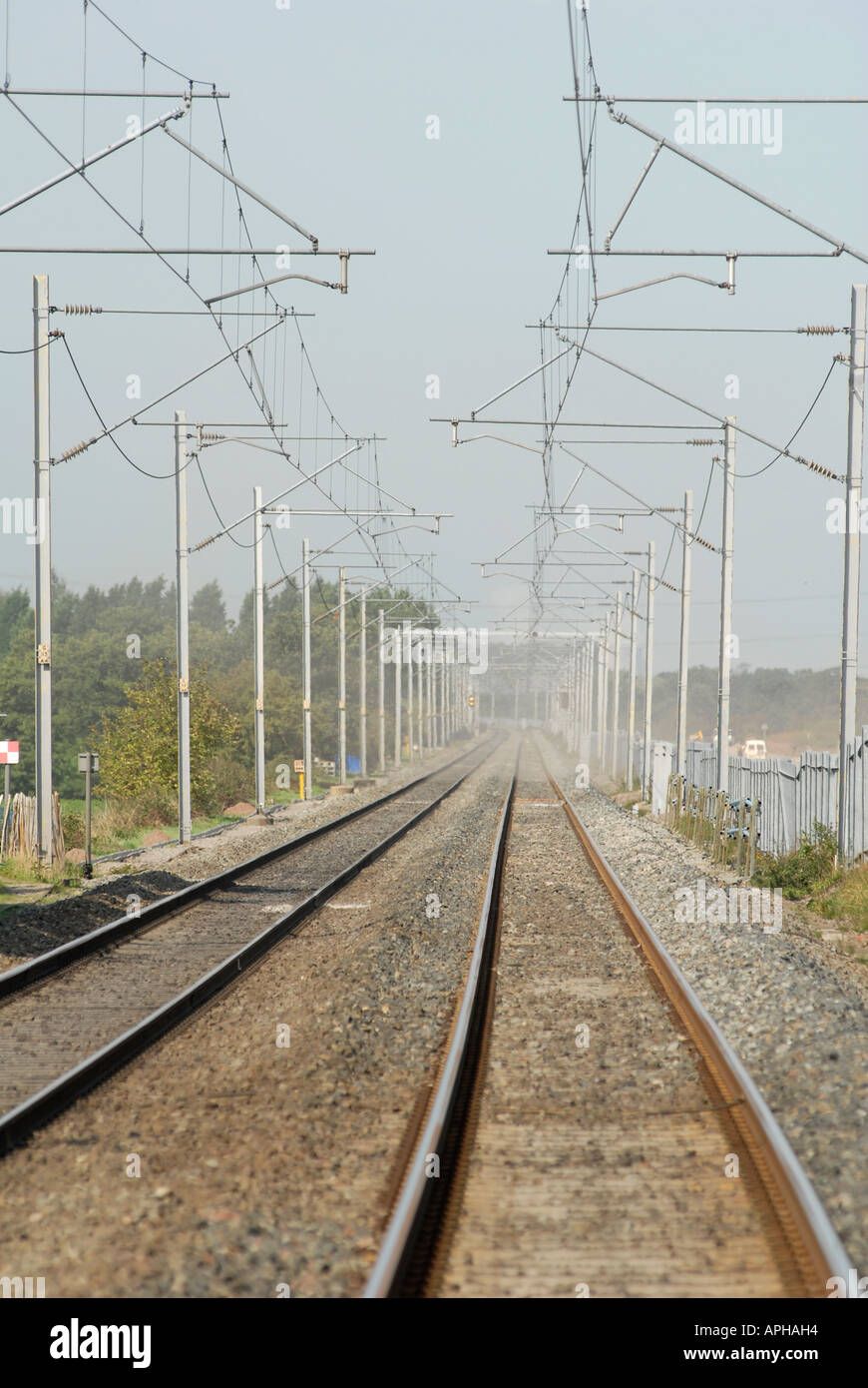 Empty railway track stretching into the distance on the west coast main ...