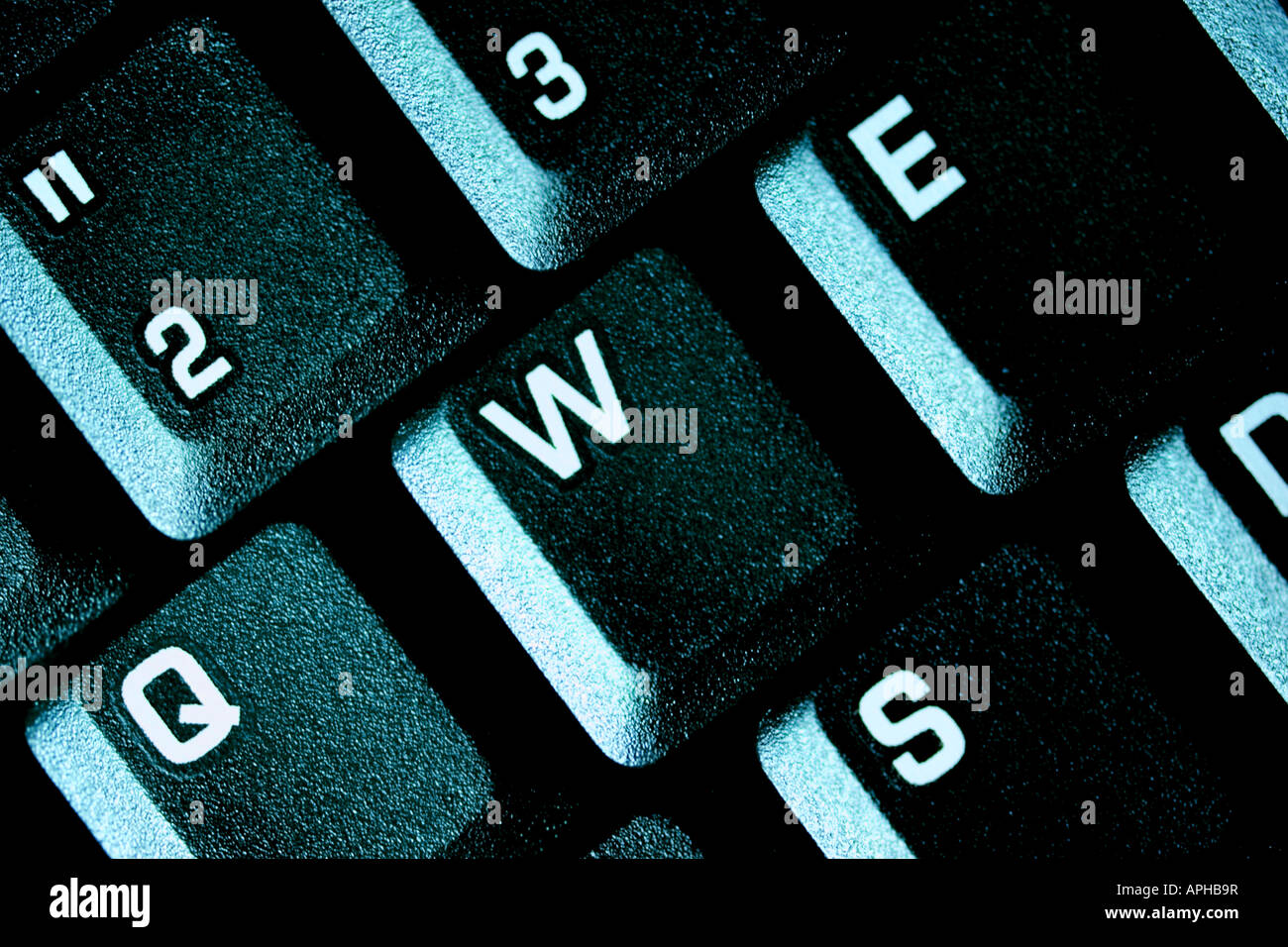 Close-up of computer keyboard with dramatic side lighting Stock Photo ...