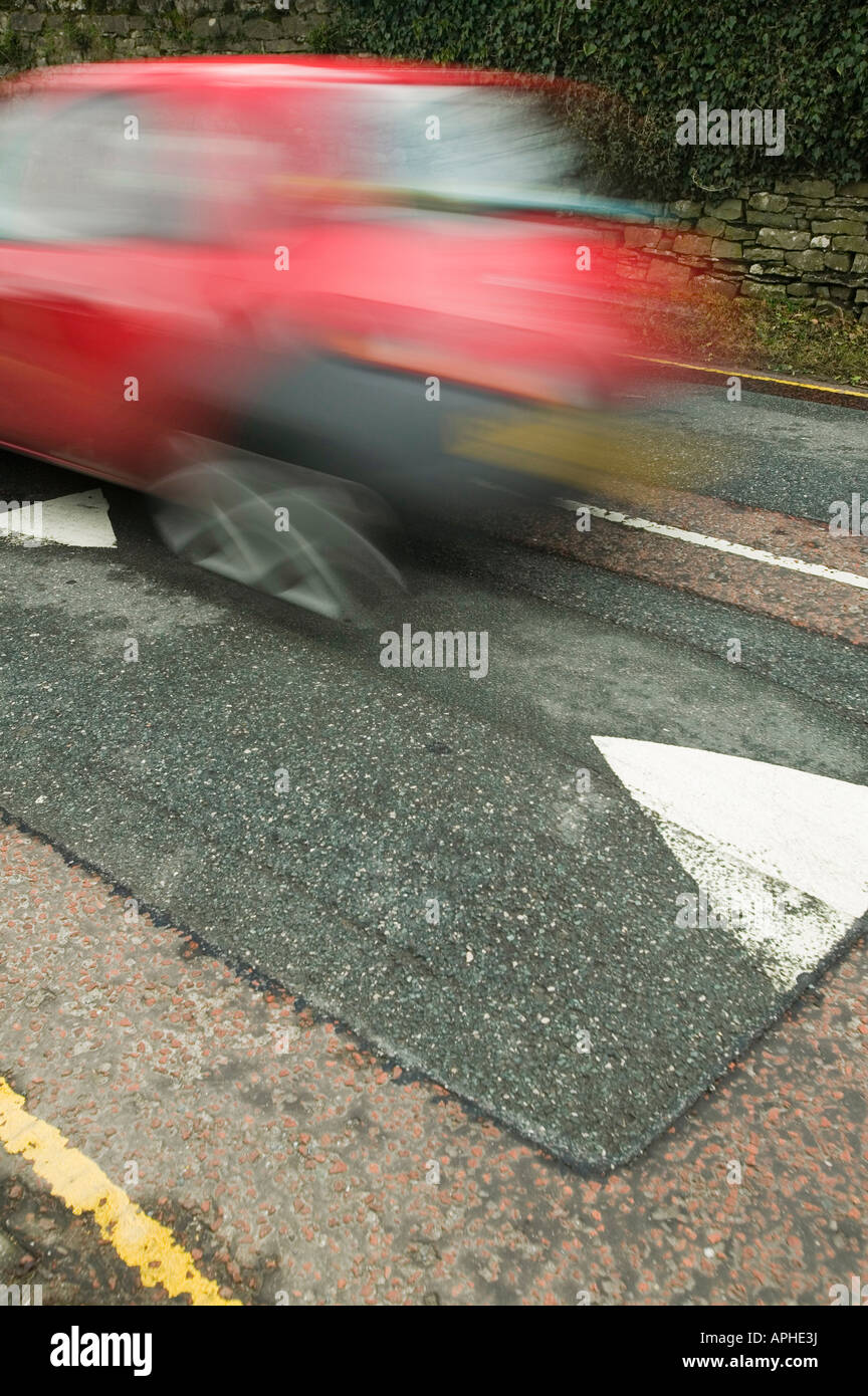 Speed hump hi-res stock photography and images - Alamy