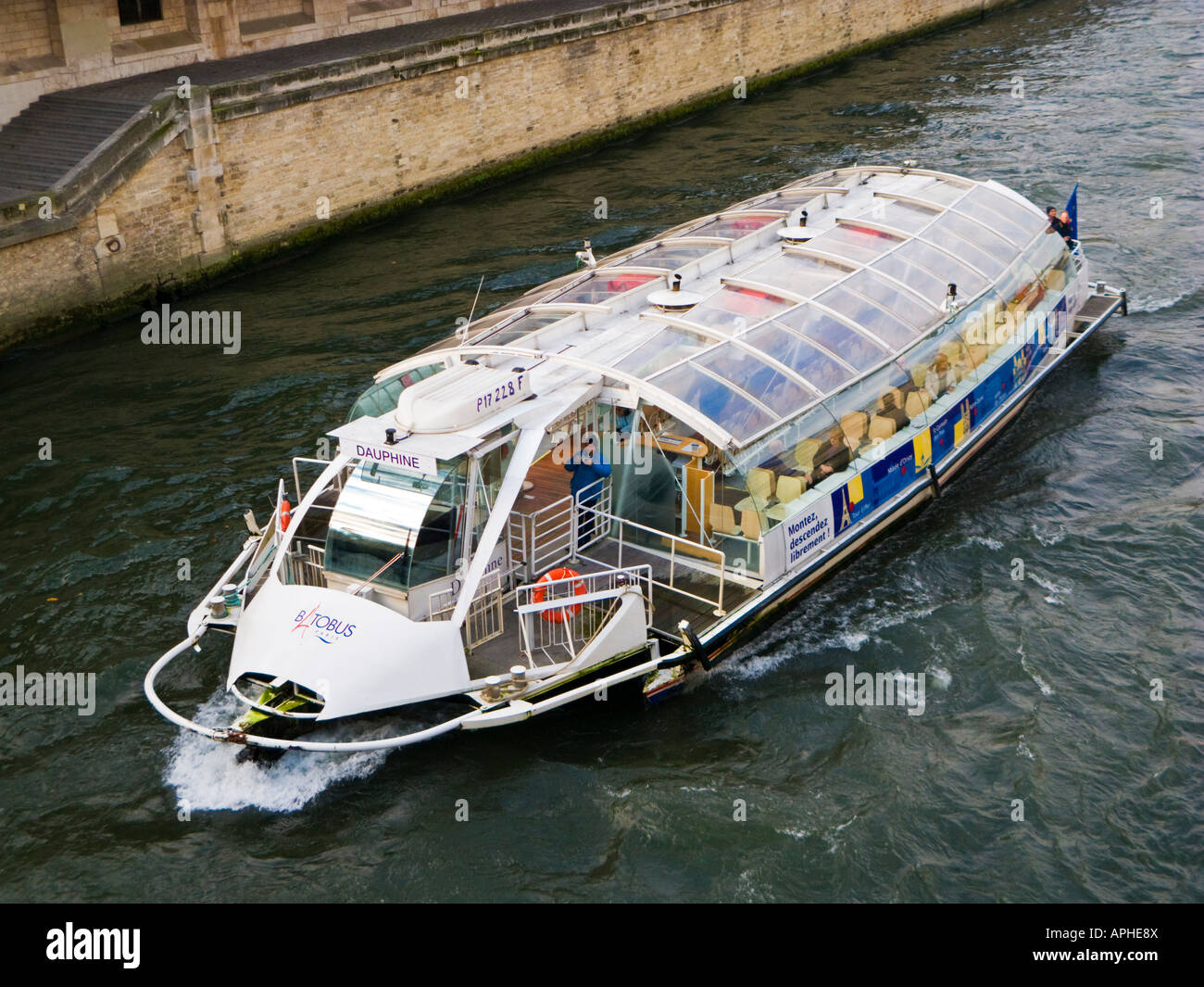 Batobus river bus travelling along the Seine in Paris France Europe ...