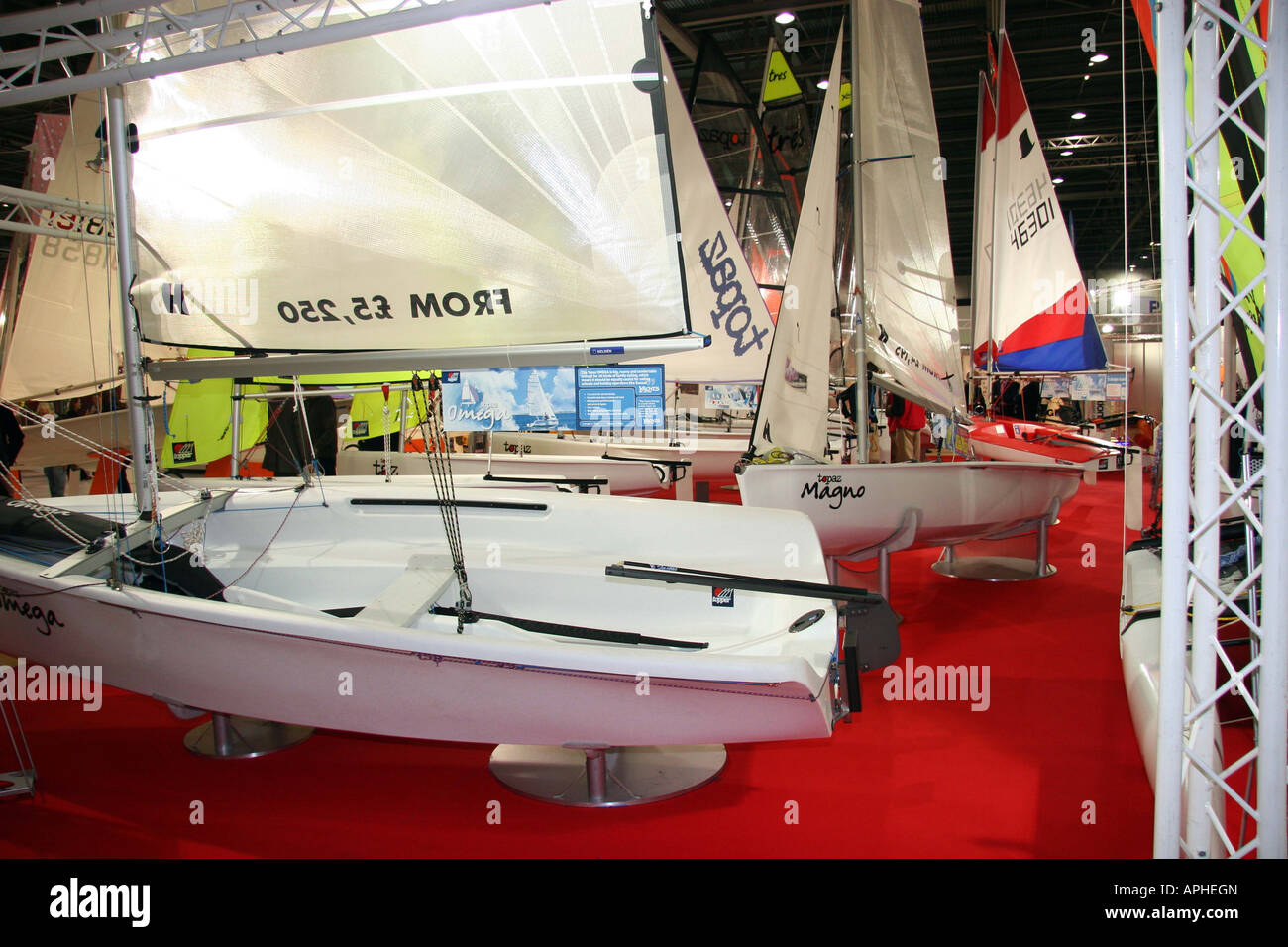 a selection of small sailing dingies at the london boat show Stock ...