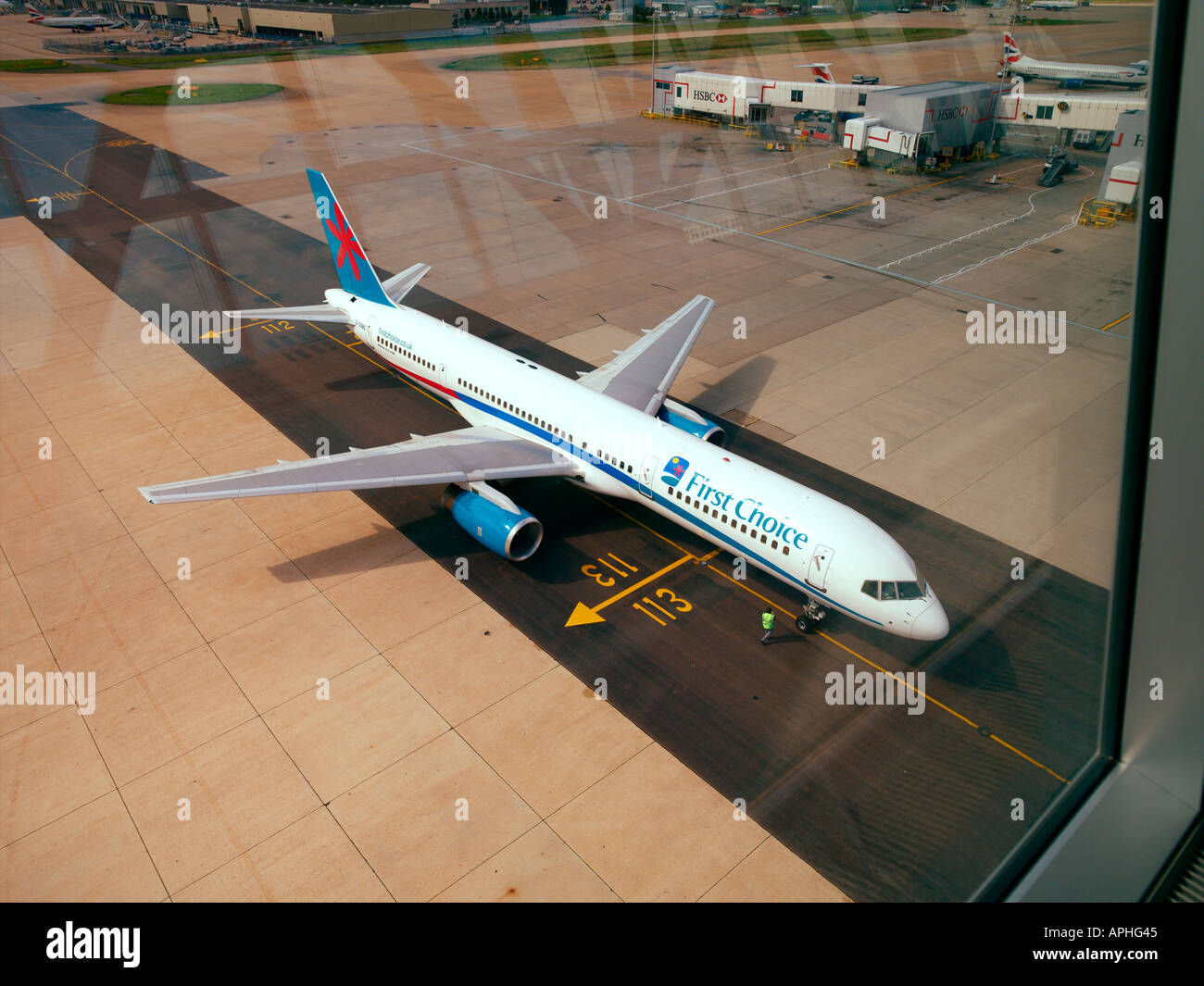 Boeing 757 airplane viewed from above from the walkway at Gatwick ...
