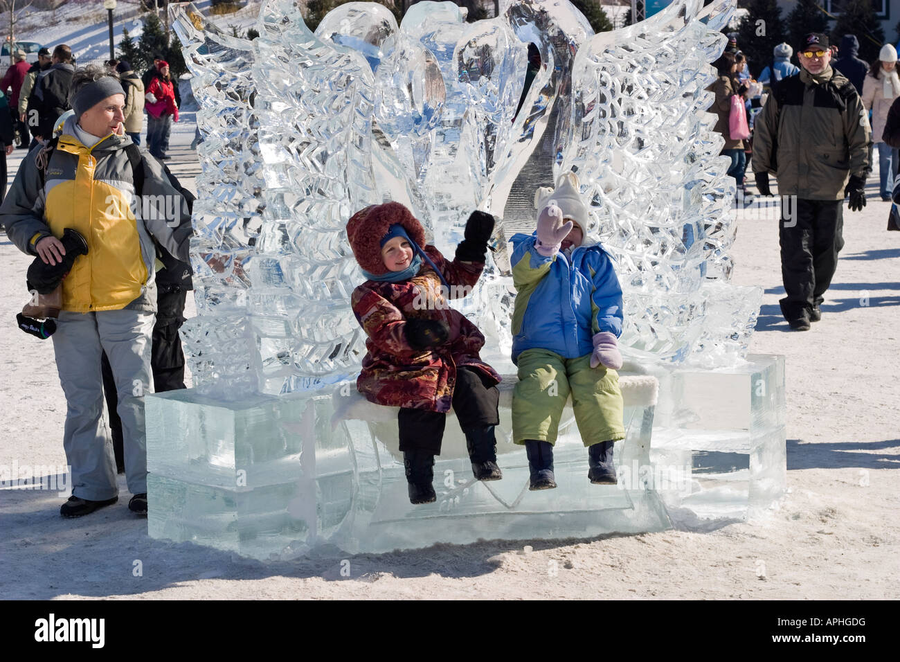 2 kids sitting on an ice sculpture Winterlude Ottawa Canada Stock Photo ...