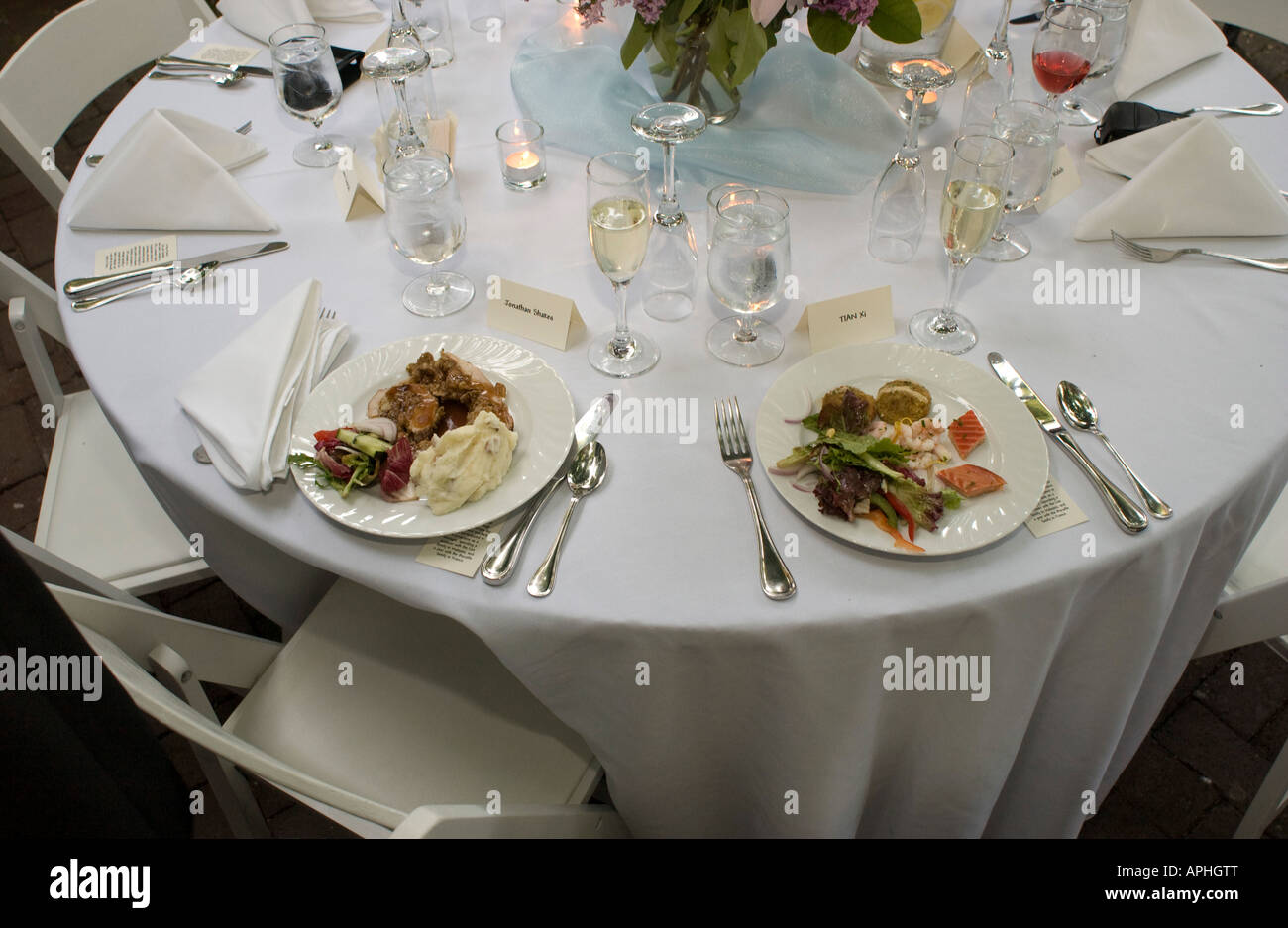 A formal sit down meal is served Stock Photo - Alamy