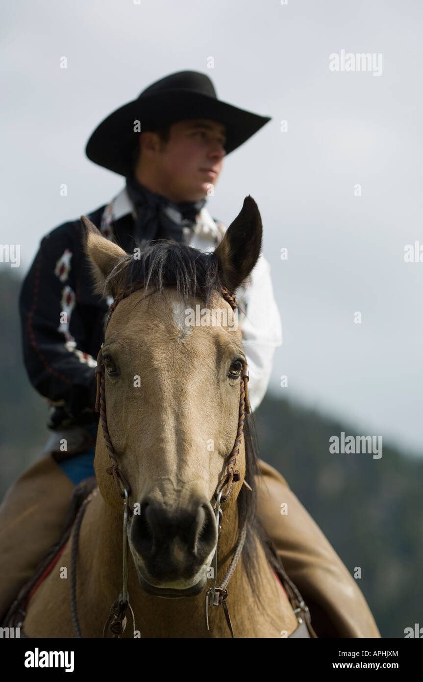 A Montana cowboy and his horse Stock Photo - Alamy