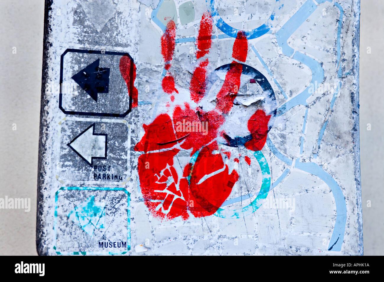 Red hand print handprint on a wall. Graffiti over town map. Haarlem ...