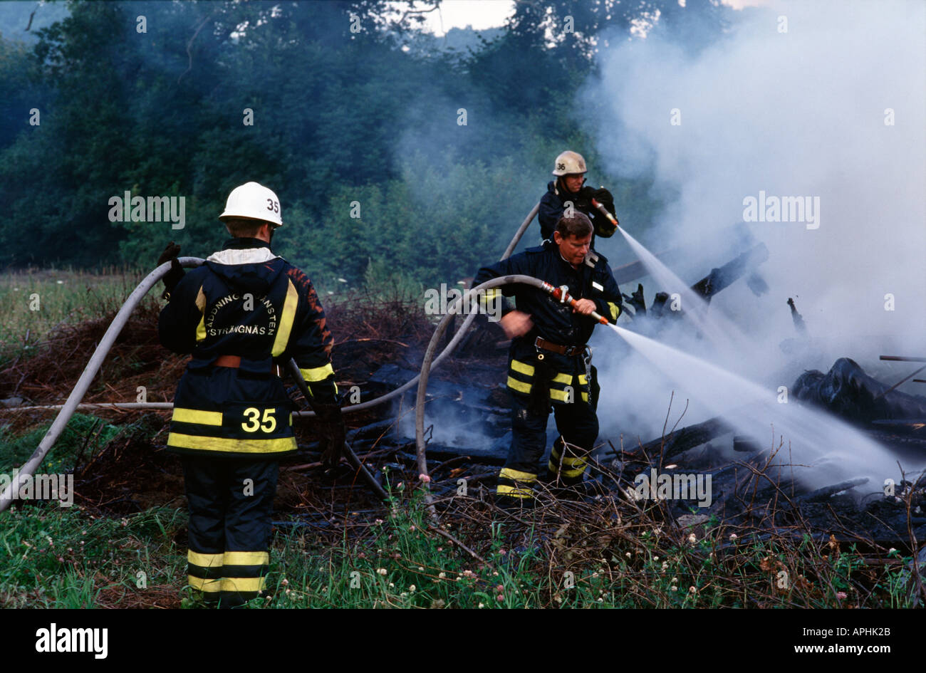 Fire brigade at work Stock Photo - Alamy