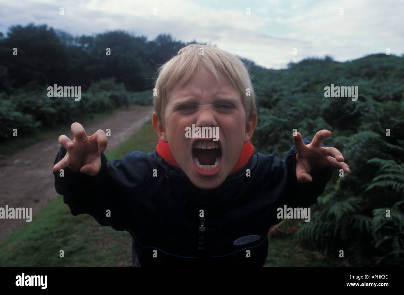 Young boy in bad mood , Somerset , Aug 2005 Stock Photo - Alamy