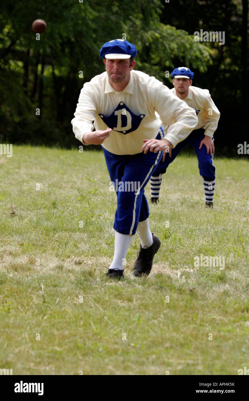 Baseball player pitching the ball at a vintage baseball game being ...