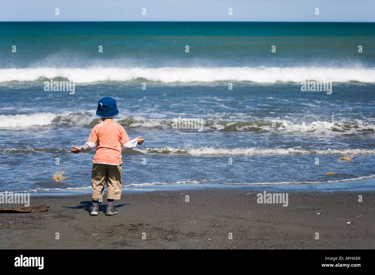 Boy at the beach Stock Photo - Alamy