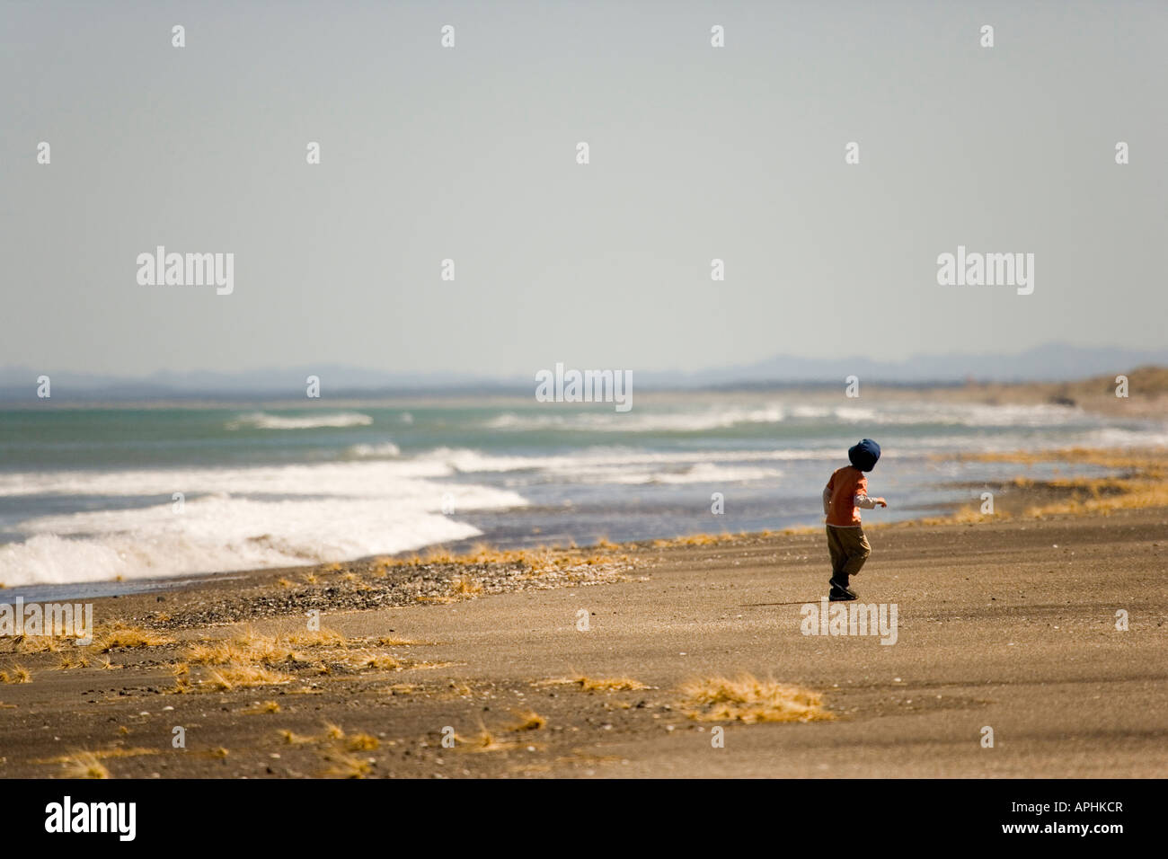 Boy at the beach Stock Photo - Alamy