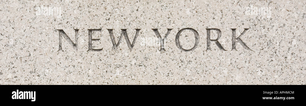 New York state name written in grey granite stone Stock Photo - Alamy