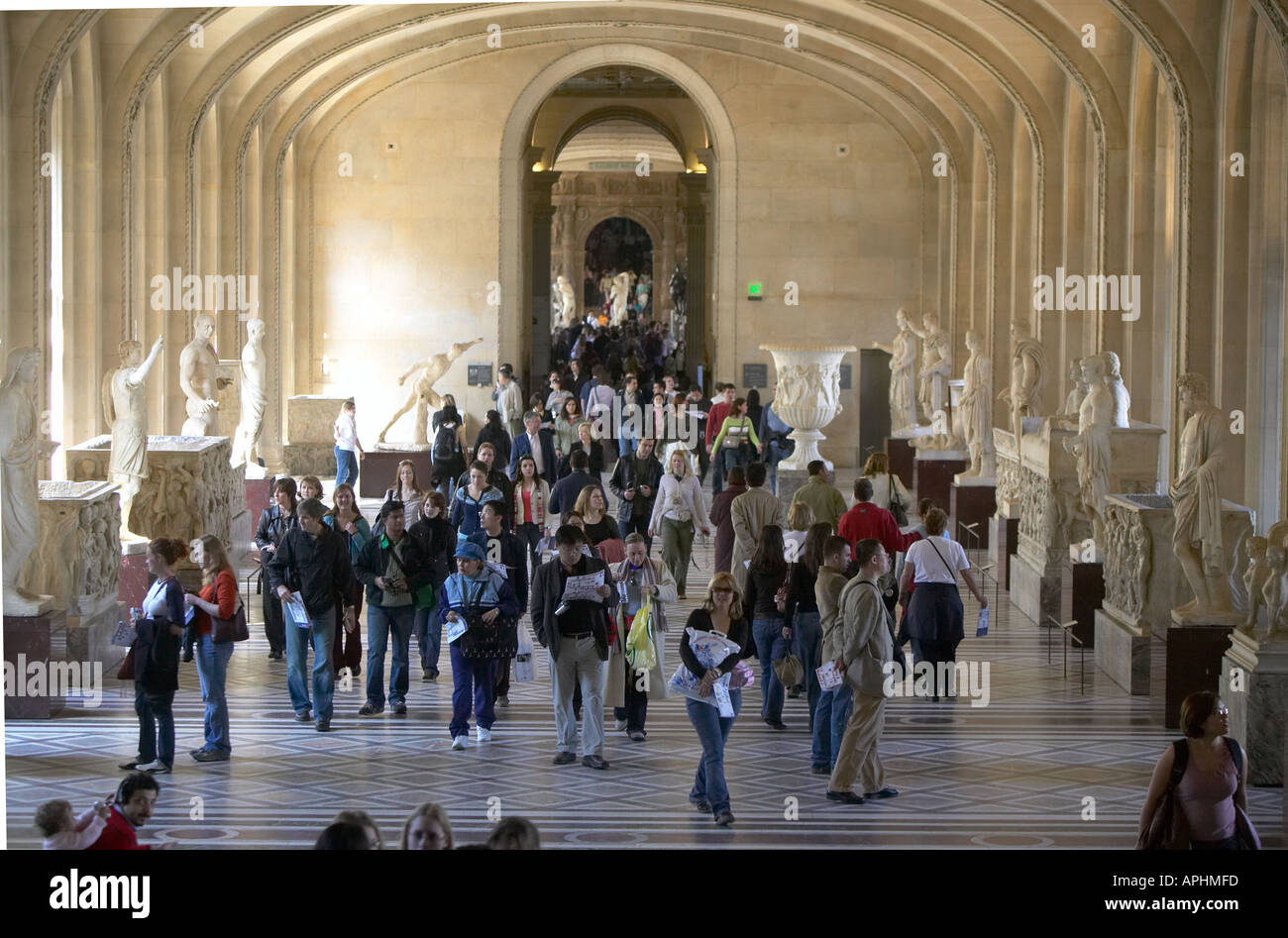 Pic By Edward Moss Visitors pass through one of the museums in Paris ...