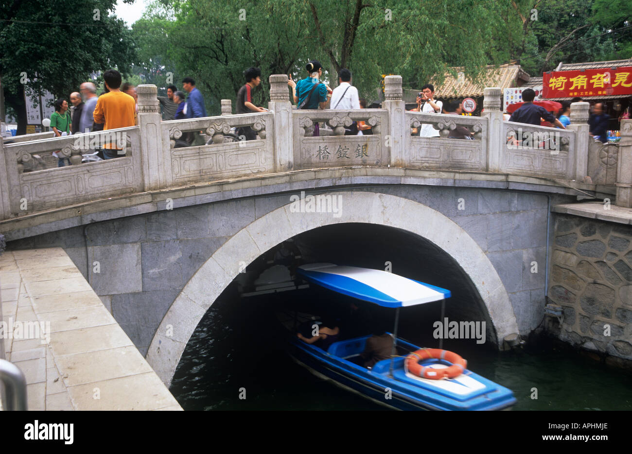 People on bridge and boats on Houhai Lake Beijing Stock Photo - Alamy