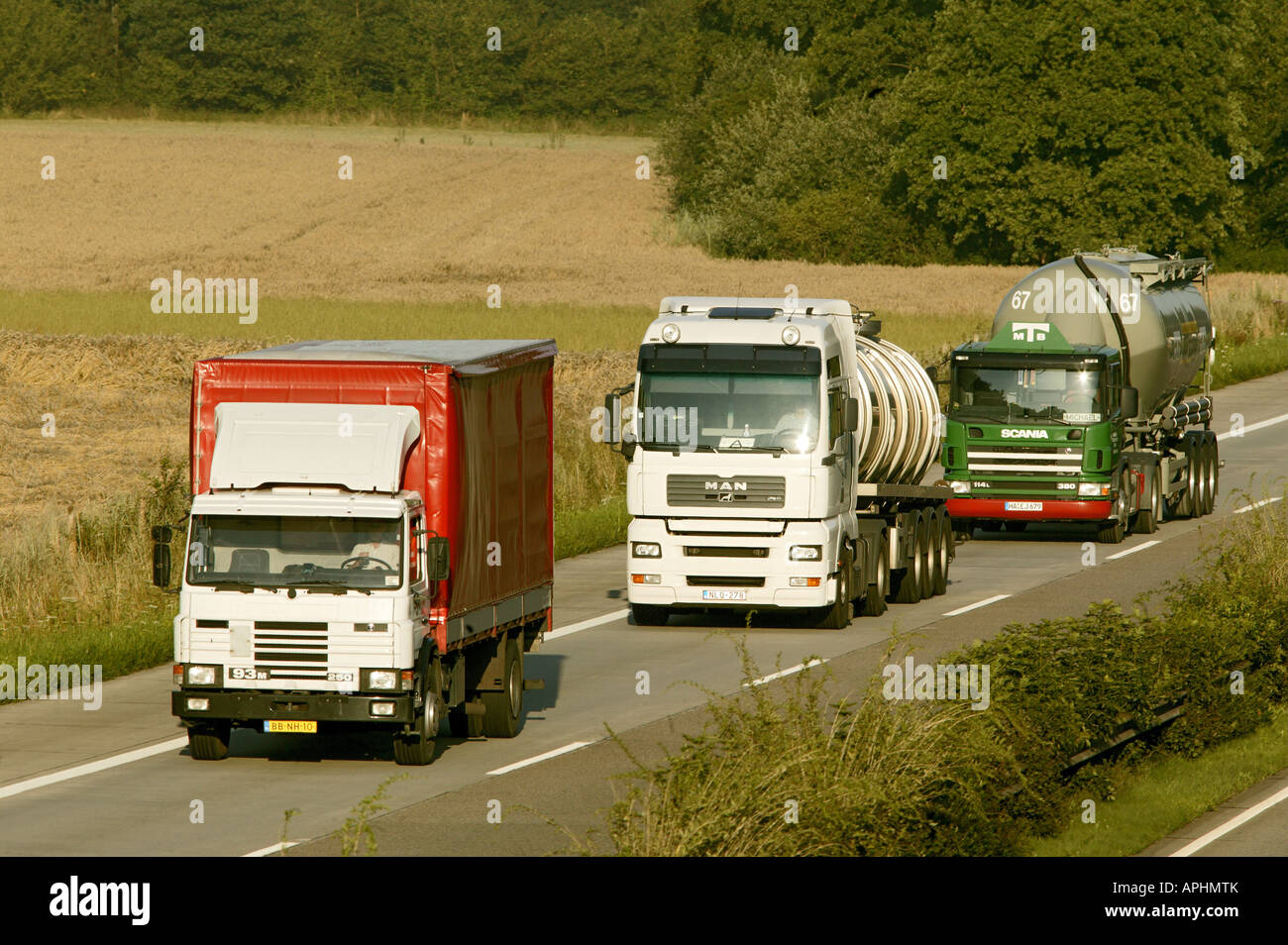 trucks on highway in Germany Stock Photo - Alamy