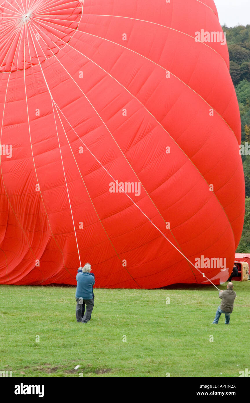 Launching hot air balloon Stock Photo - Alamy