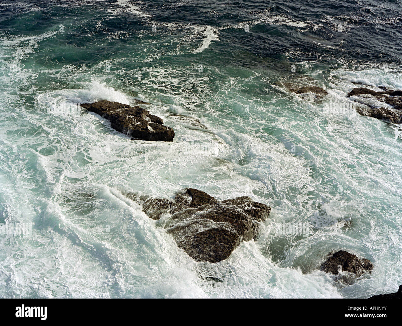 a view of the sea rocks and coast line in cornwall at sunset Stock ...