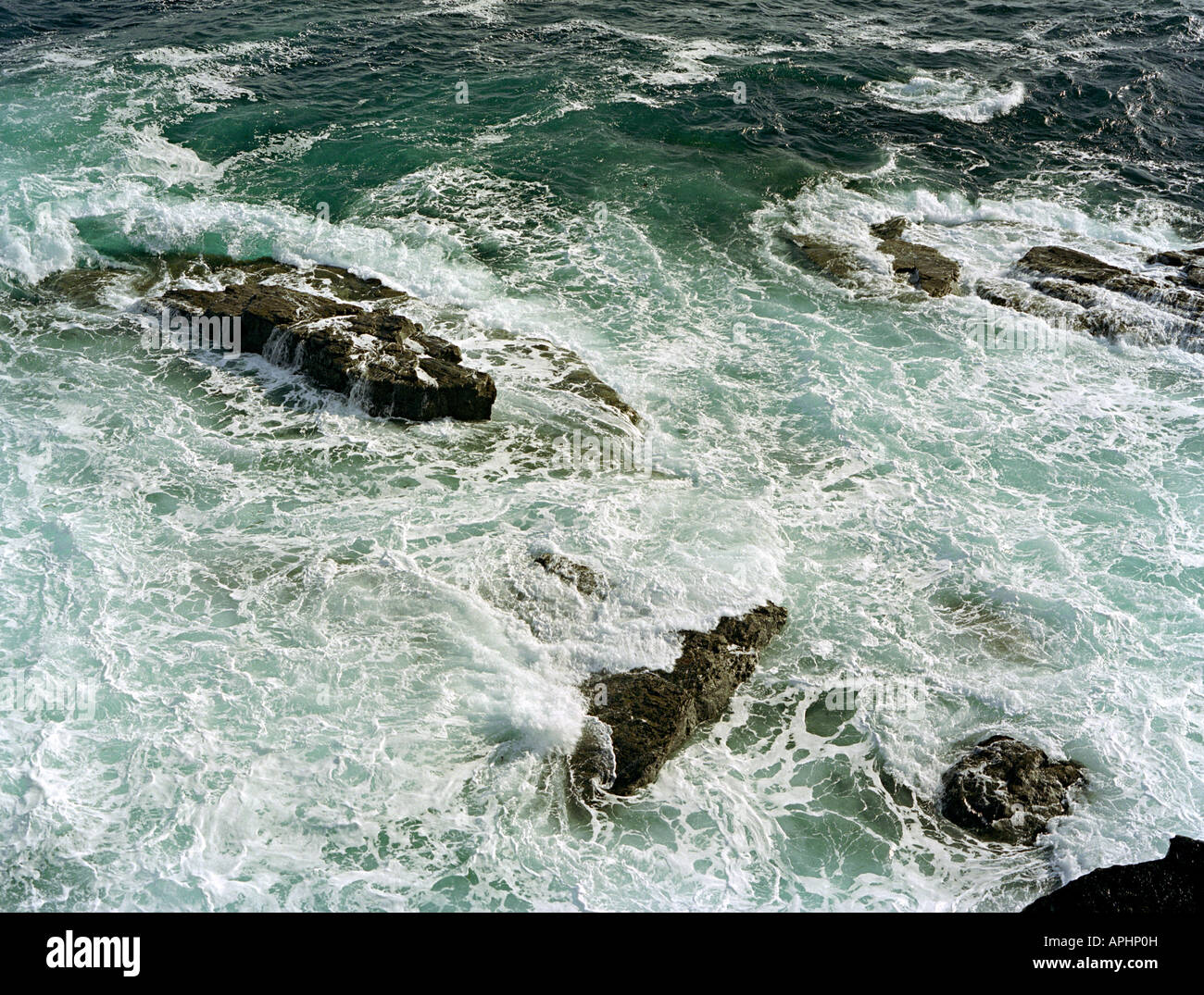 a view of the sea rocks and coast line in cornwall at sunset Stock ...
