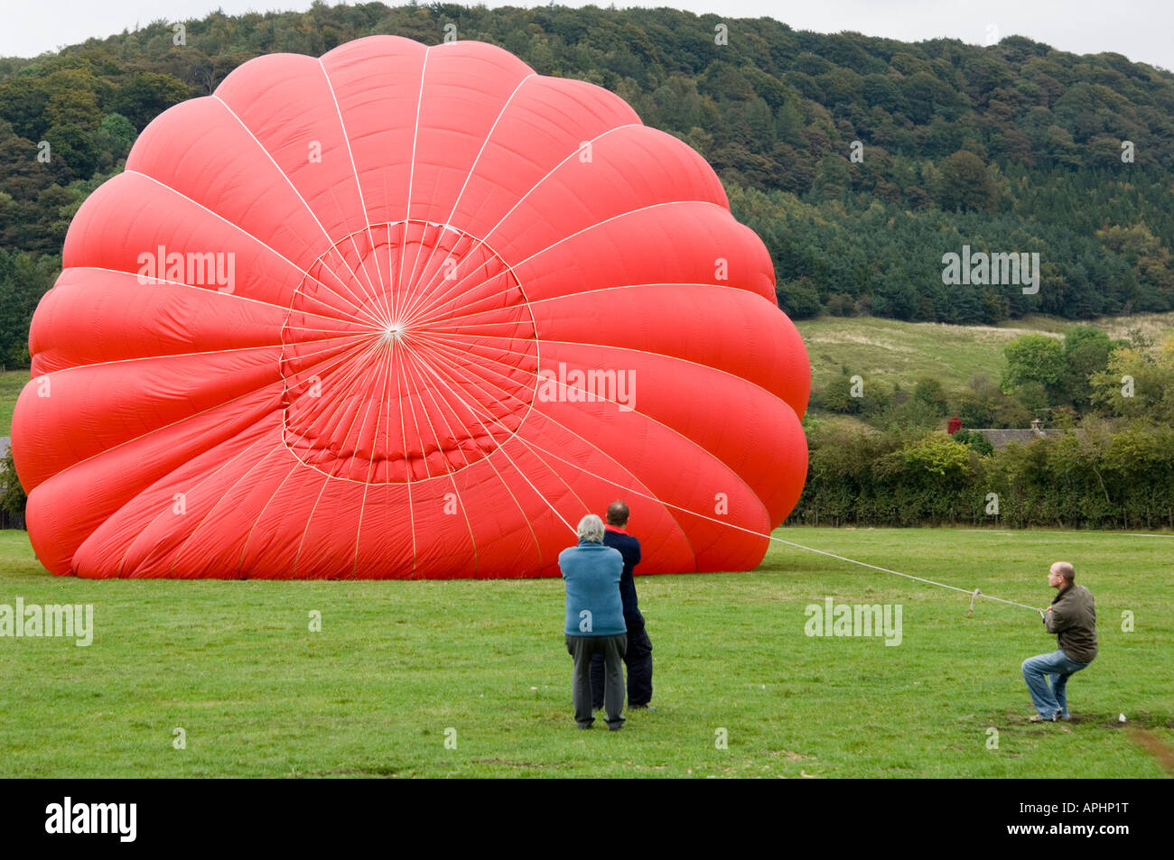 Launching hot air balloon Stock Photo - Alamy