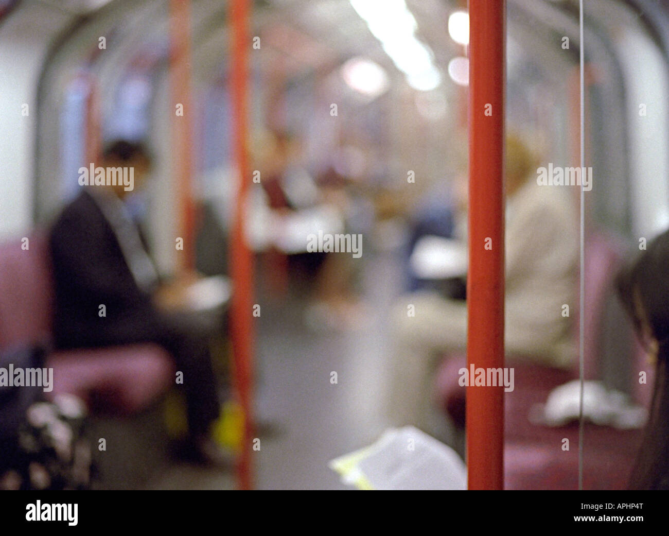 tube journey with people travelling in london with background out of ...