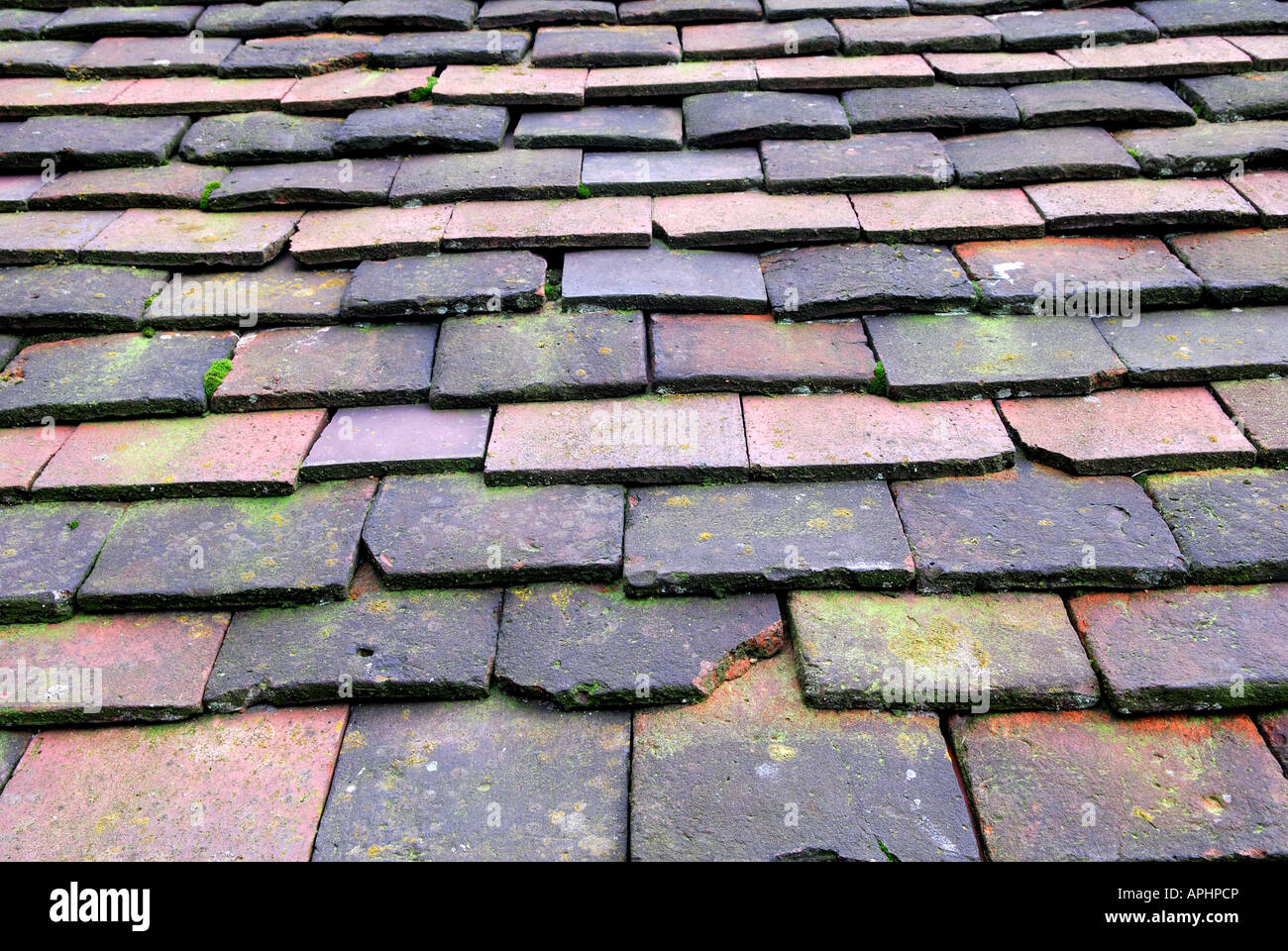 Damaged roof tiles hi-res stock photography and images - Alamy