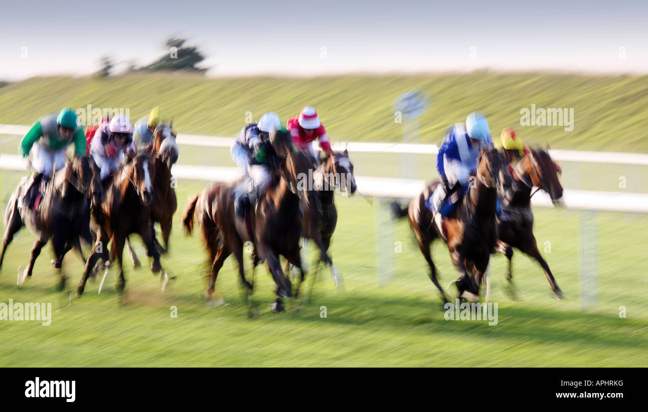 Horse racing UK - Motion blur in a horse race, Newmarket July ...