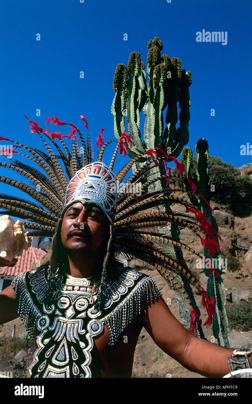 A Dudian performer in costume at the tourist attraction of La Bufadora ...