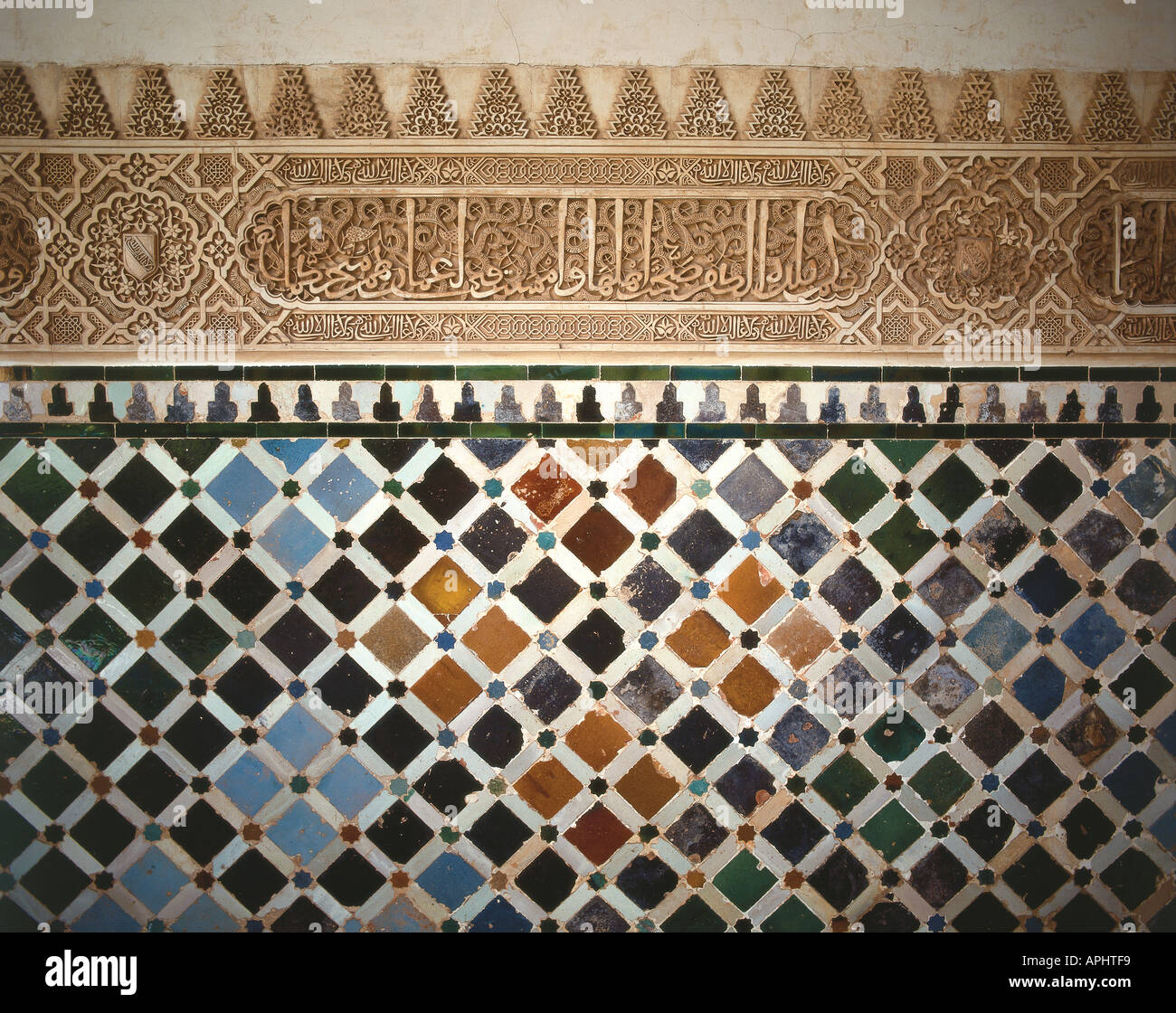 Colourful mosaic of glazed tiles plaster panels carved with floral ...