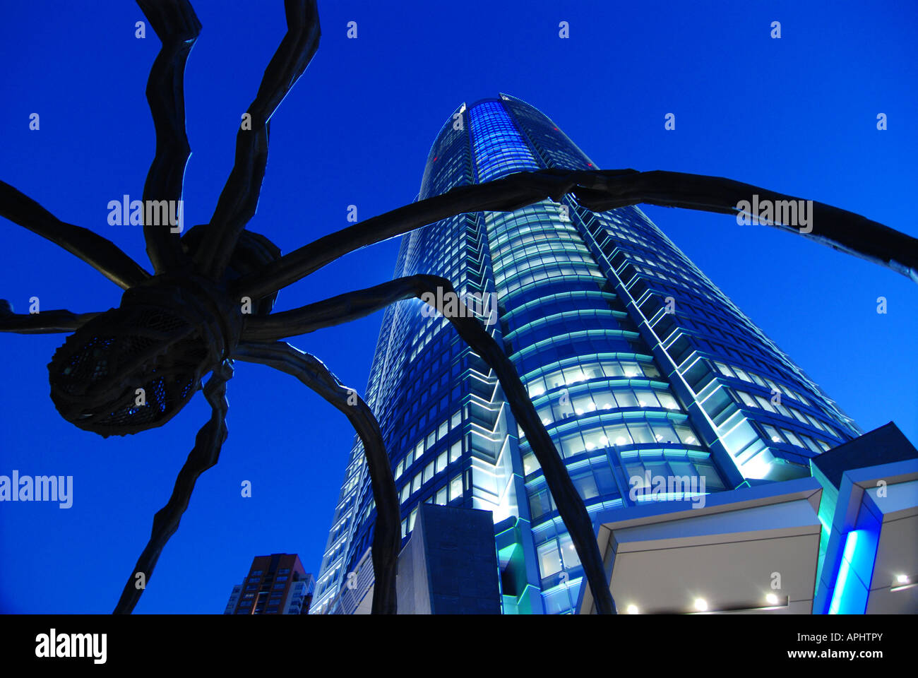 spider sculpture and Mori Tower at Roppongi Hills Stock Photo - Alamy