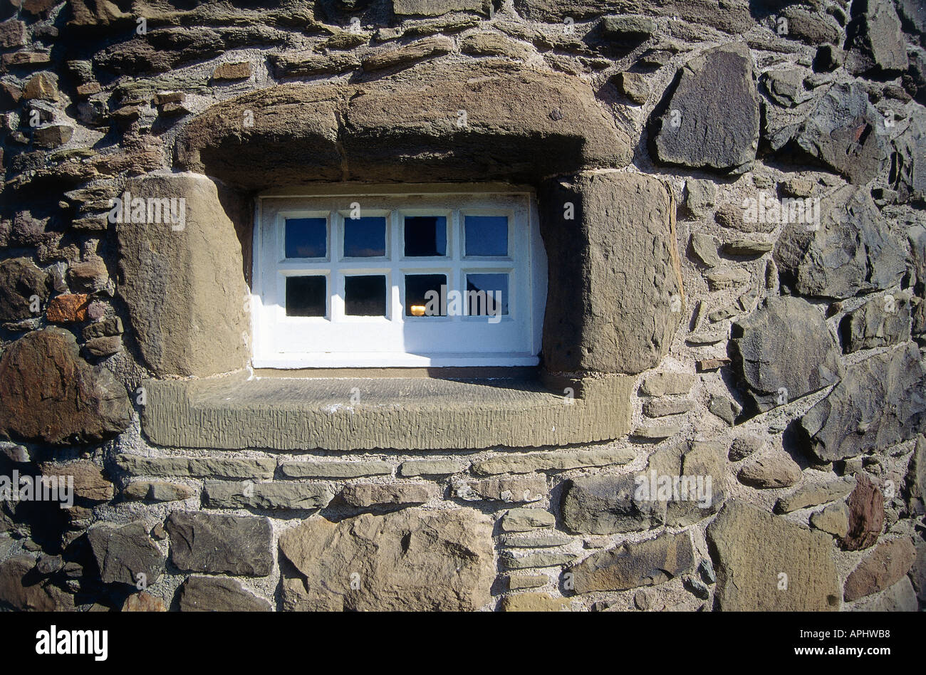 Detail of a window set deep into the walls of Claypotts Castle near ...