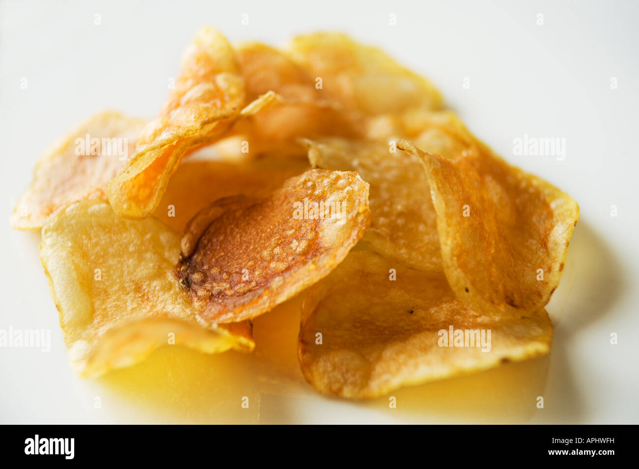 potato crisps on white background Stock Photo - Alamy