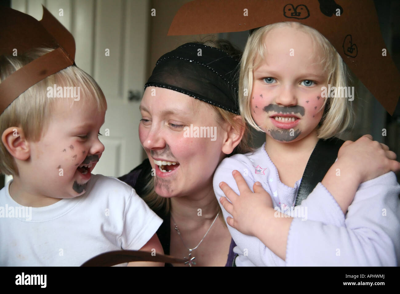 family in fancy dress Stock Photo - Alamy
