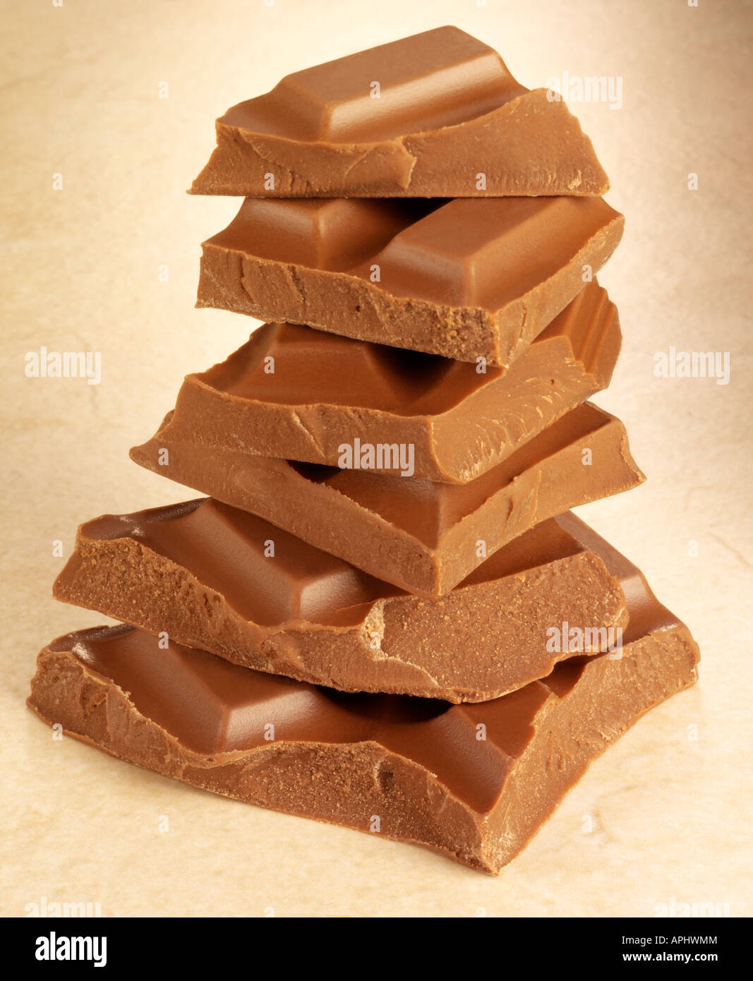 STACK OF MILK CHOCOLATE PIECES Stock Photo - Alamy