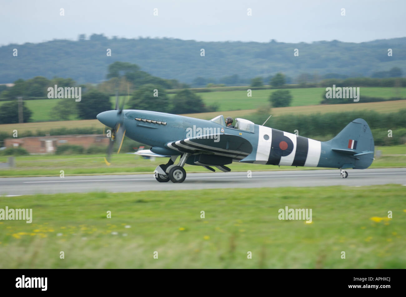 spitfire landing at Exeter Airport Uk England Stock Photo - Alamy
